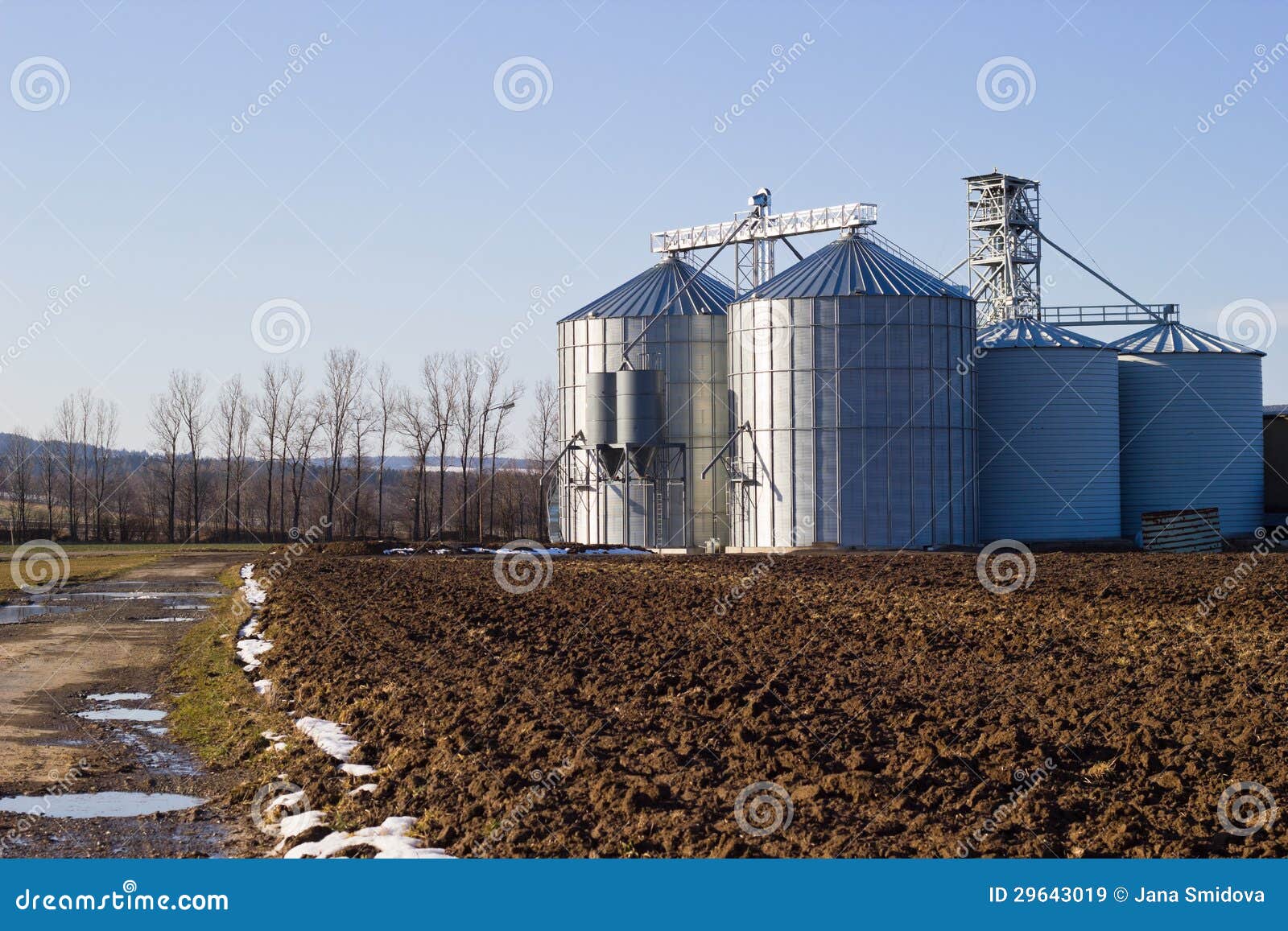 Silos for Grain on a Plowed Field Stock Image - Image of plant ...