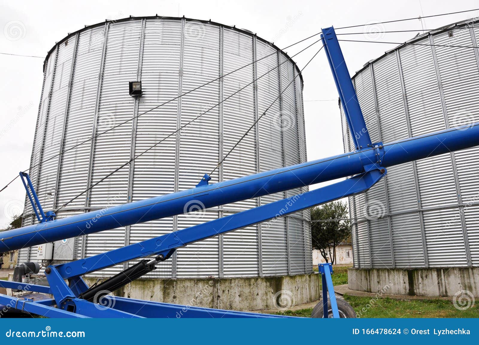 Silos for grain storage stock photo. Image of building - 166478624