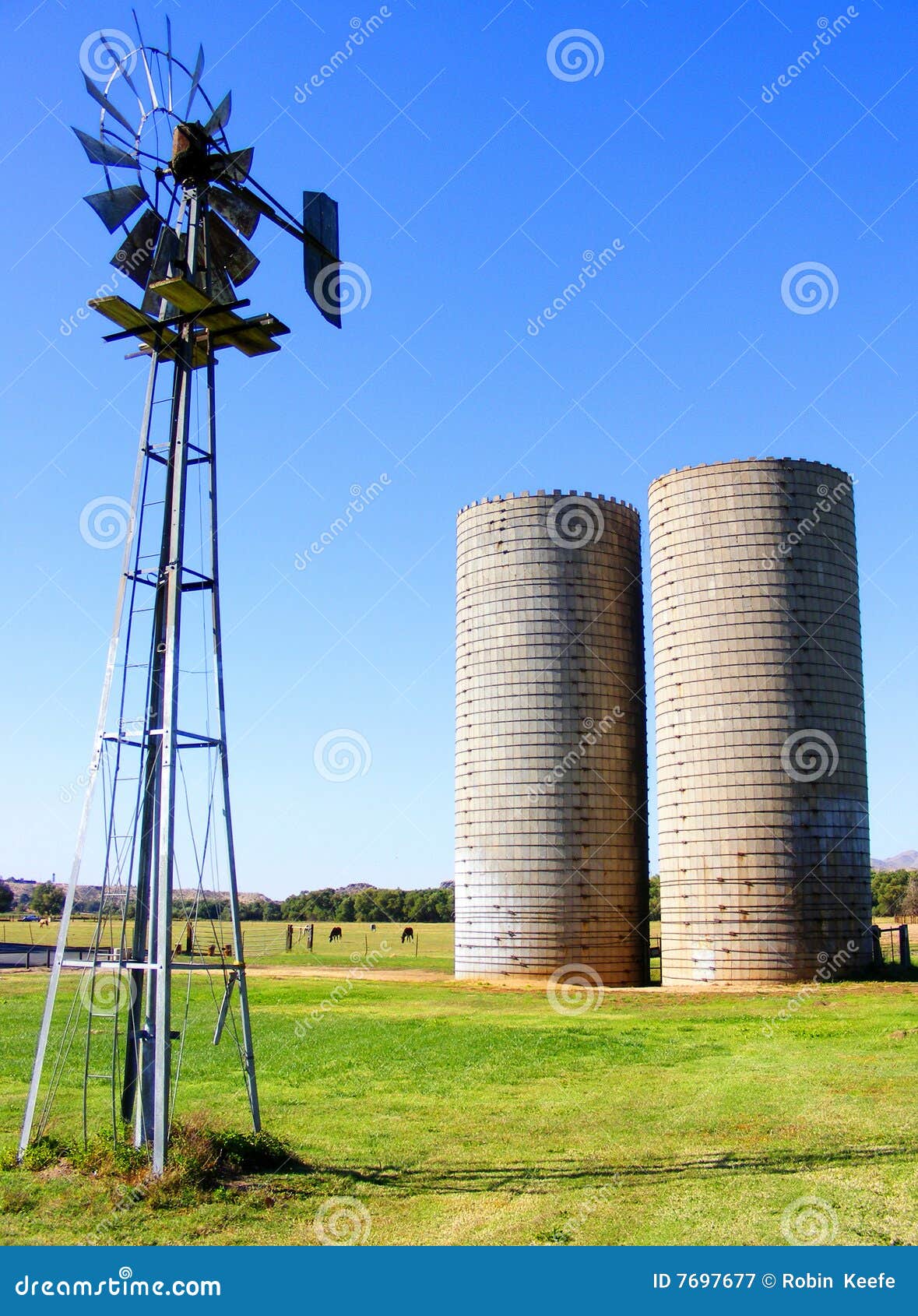 Silos and Windmill stock image. Image of rural, retro - 7697677