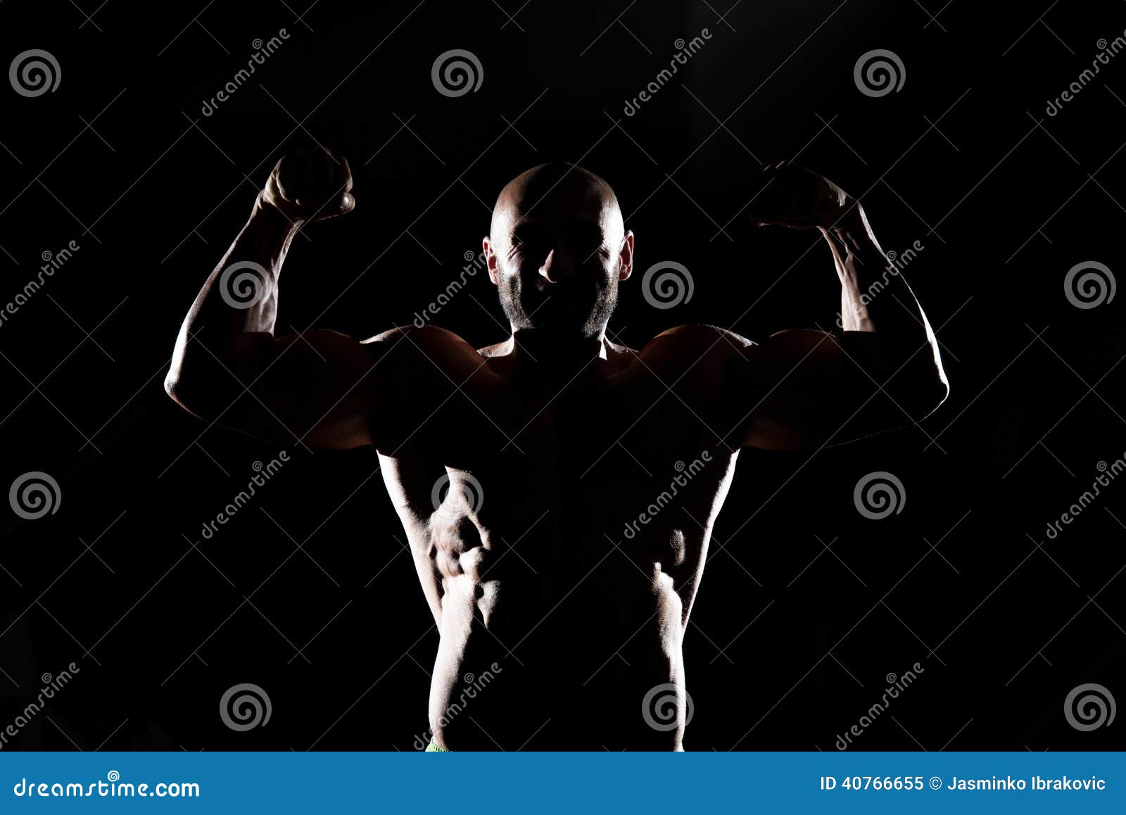 Siluet Muscular Man Flexing Muscles Stock Image - Image of dark, biceps ...