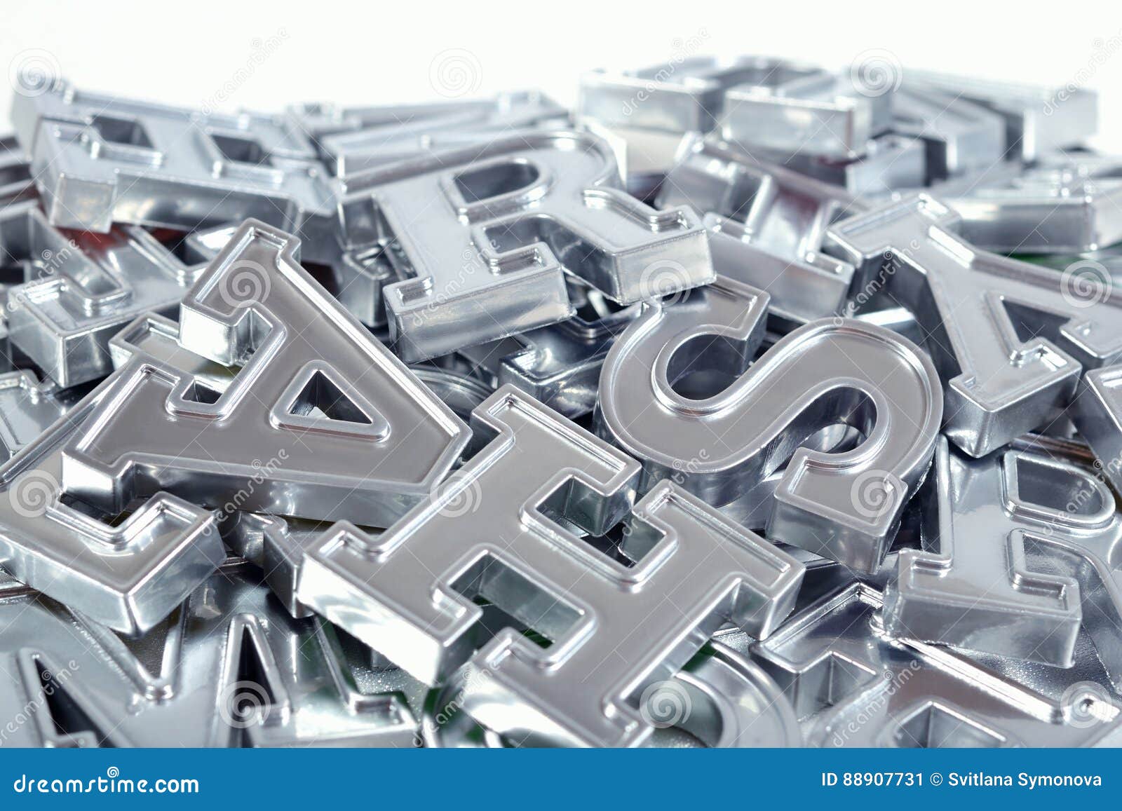 Silver Alphabet Letters Close-up on a White Stock Image - Image of ...