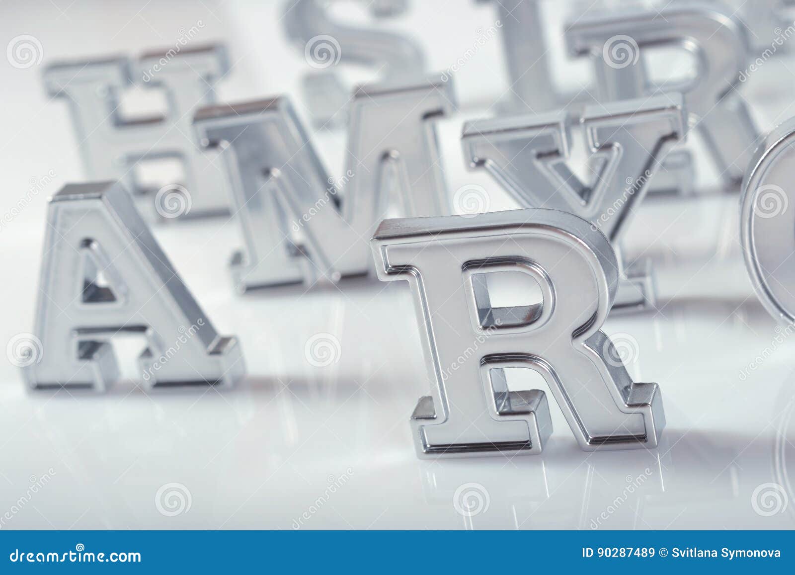 Silver Alphabet Letters Close-up on a White Stock Illustration ...