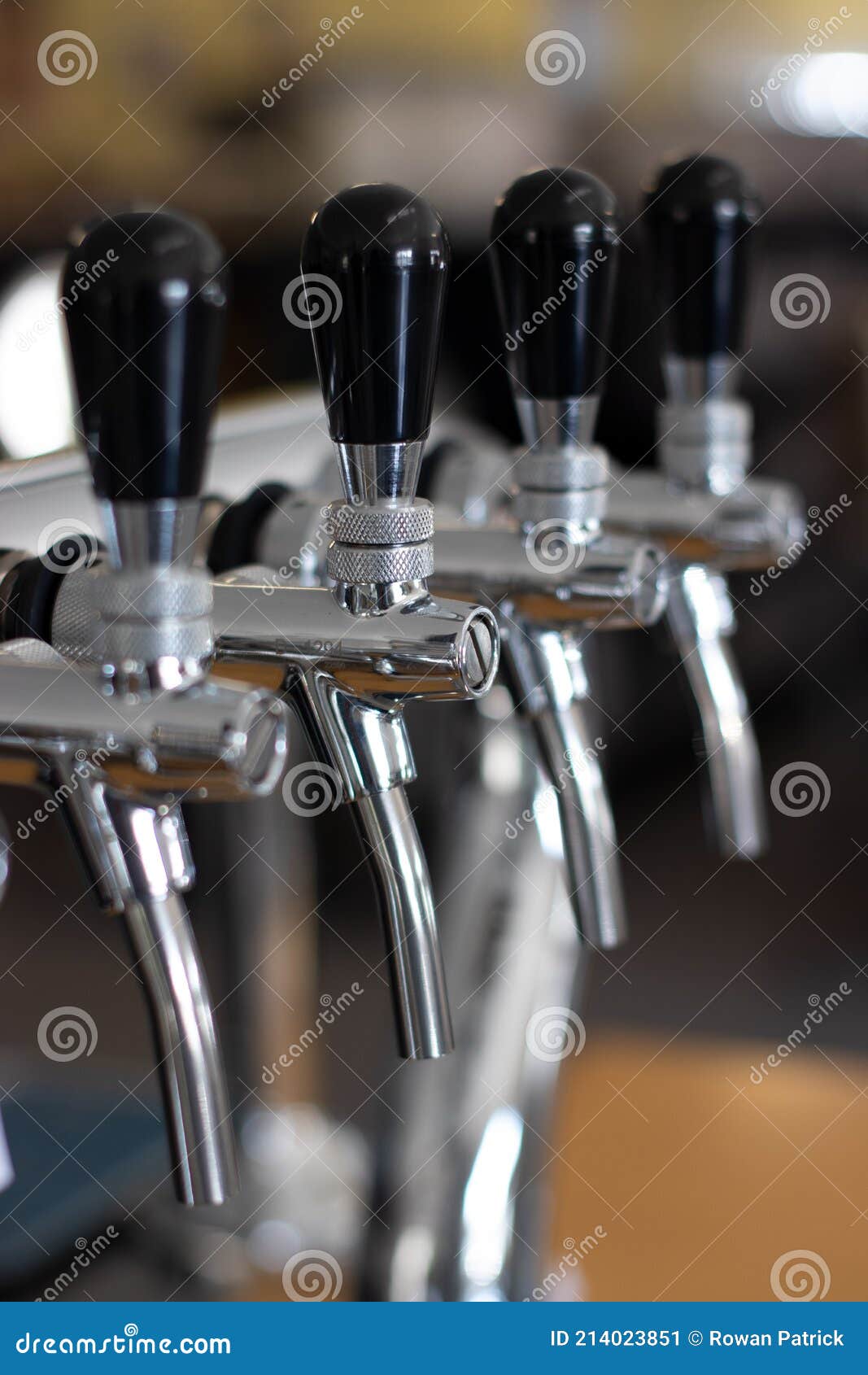 SILVER BEER DRAUGHT TAPS stock image. Image of taste - 214023851