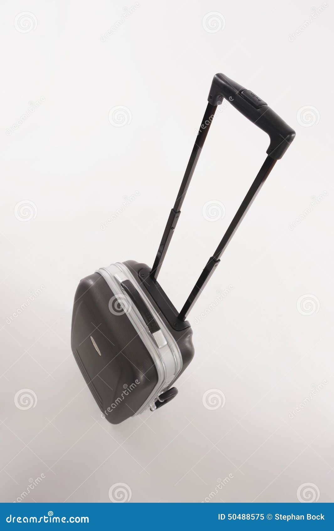 Silver and Black Suitcase with Long Handle Against White Background ...