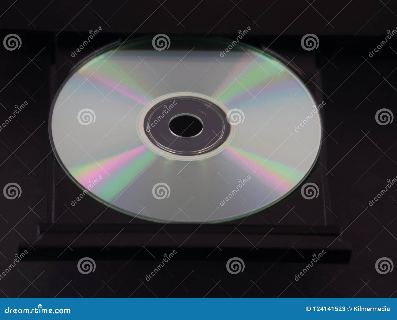 Silver CD or DVD in an Ejected Tray of a Multimedia Player Stock Image ...