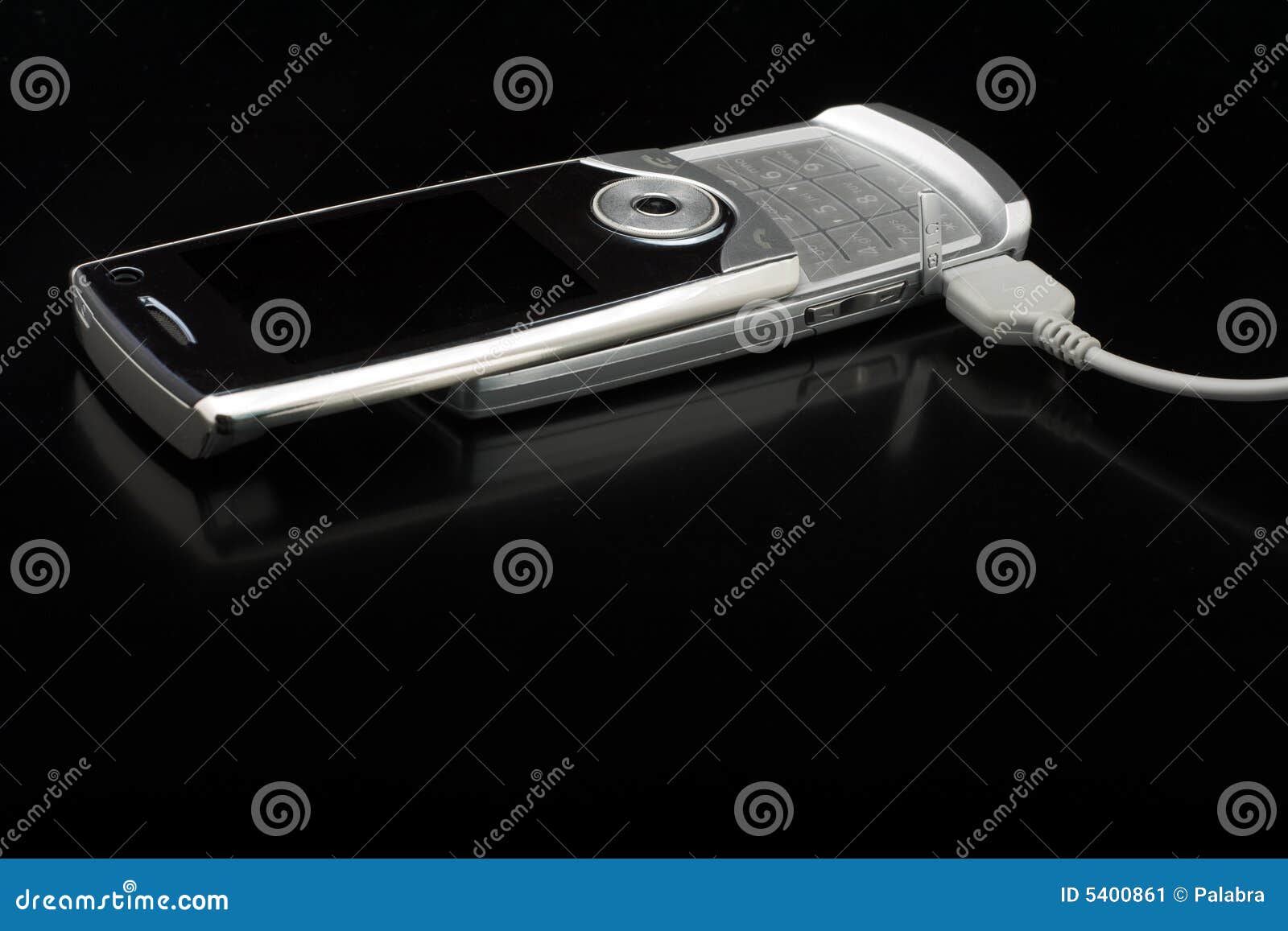 Silver cell phone stock image. Image of black, cellphone - 5400861