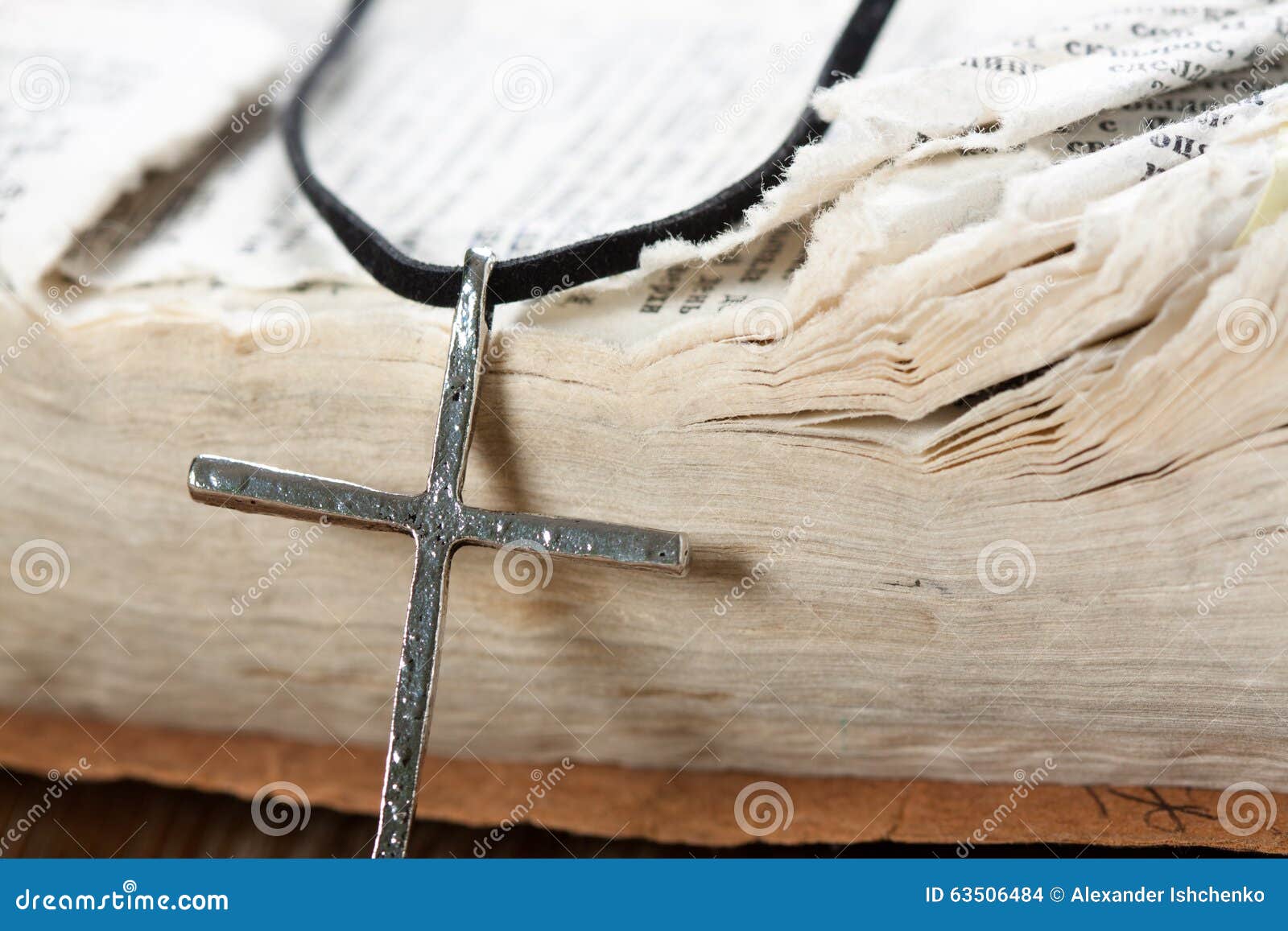 Silver Christian Cross on Bible Stock Photo - Image of necklace, holy ...