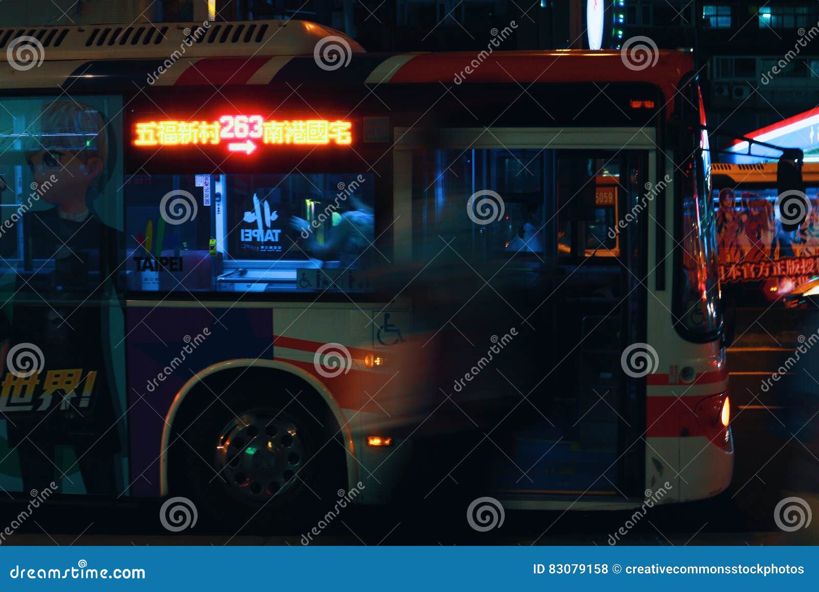 Silver City Bus On A City Street At Night Picture. Image: 83079158