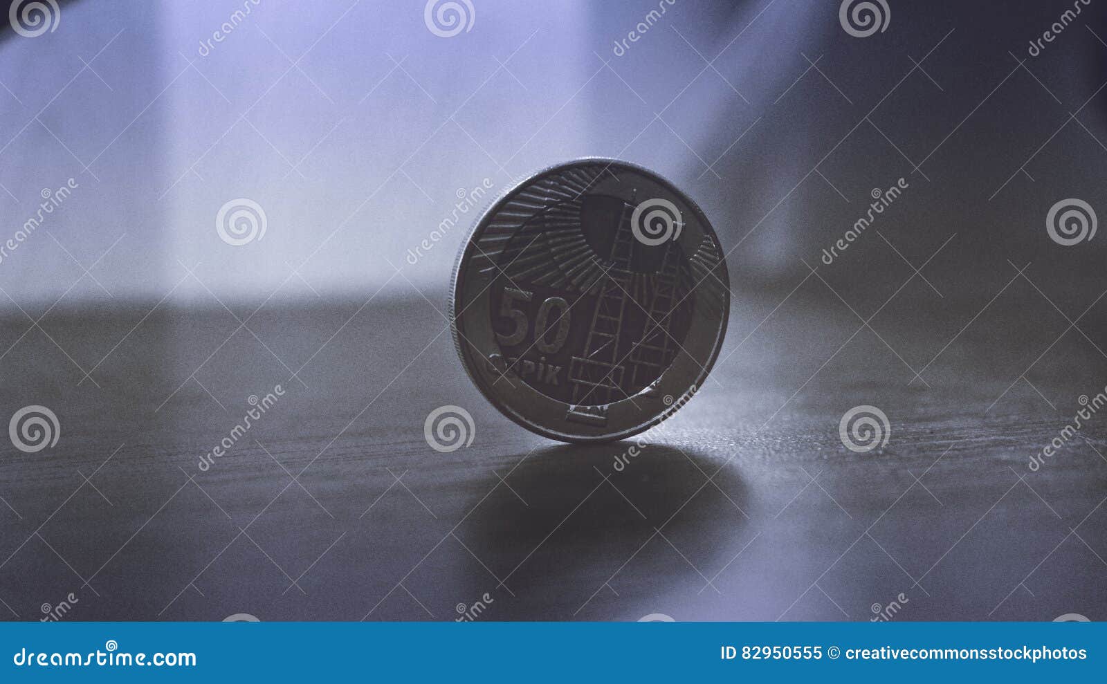 Silver Coin On Tabletop Picture. Image: 82950555