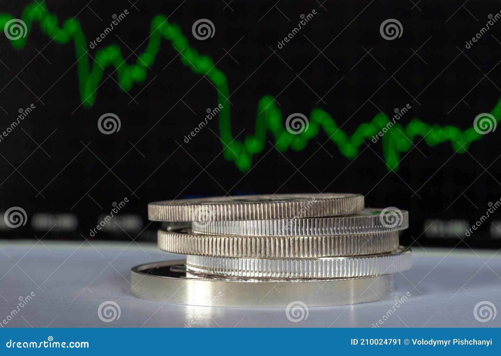 Silver Coins on the Background of the Reduction Chart. Stock Image ...