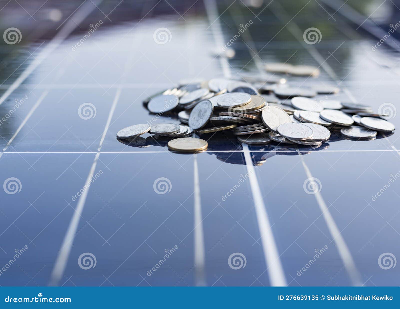 Silver Coins on the Solar Panel Help Store Solar Energy Stock Image ...