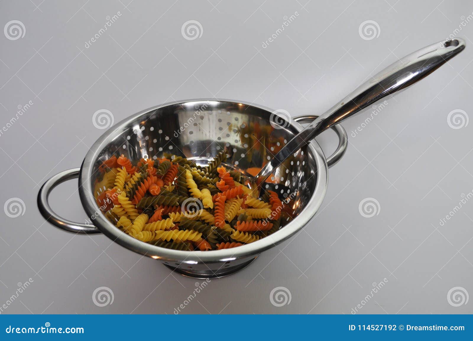 Pasta in a Colander and with a Spoon Stock Photo - Image of cooking ...