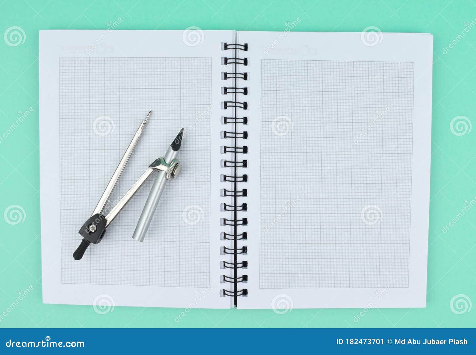 A Silver Color Pencil Crayon Attached To a Pencil Compass on Top of a ...