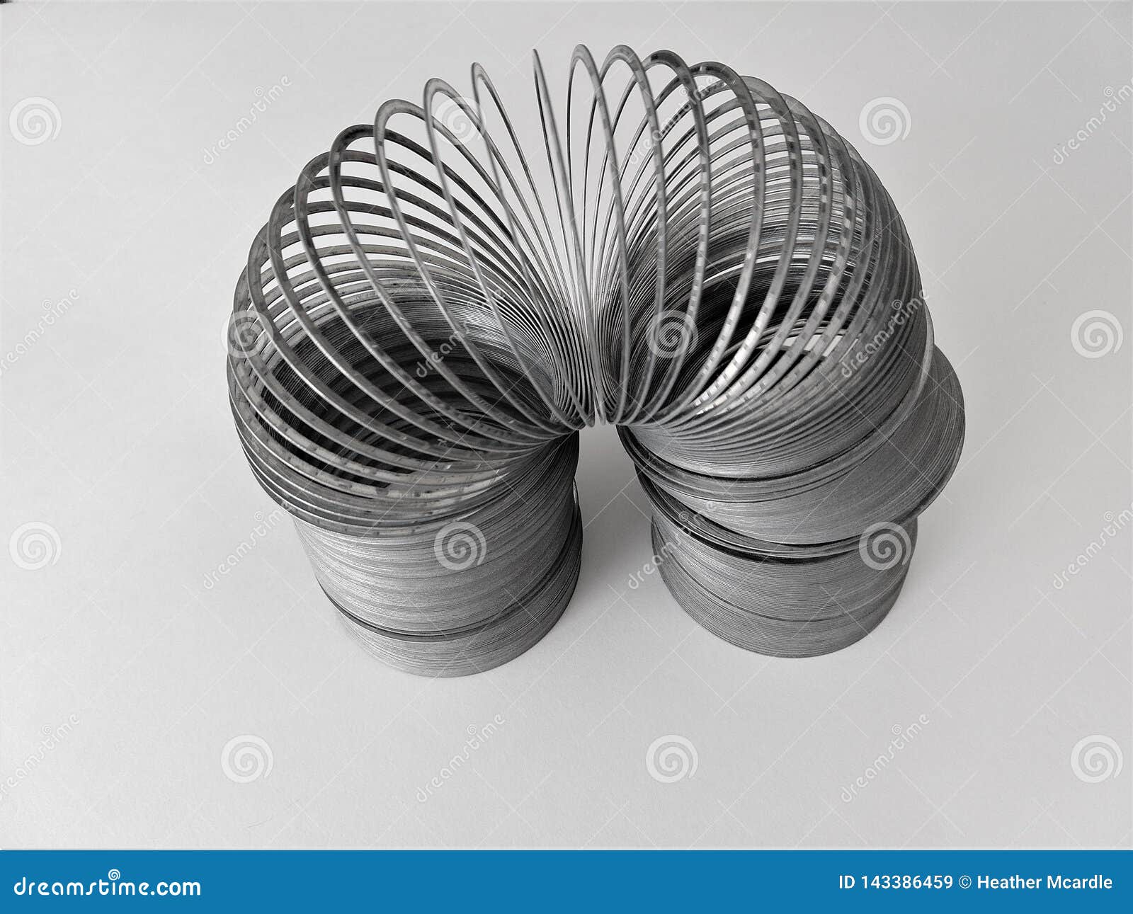 Aerial View of Metal Slinky Toy Editorial Stock Image - Image of loops ...