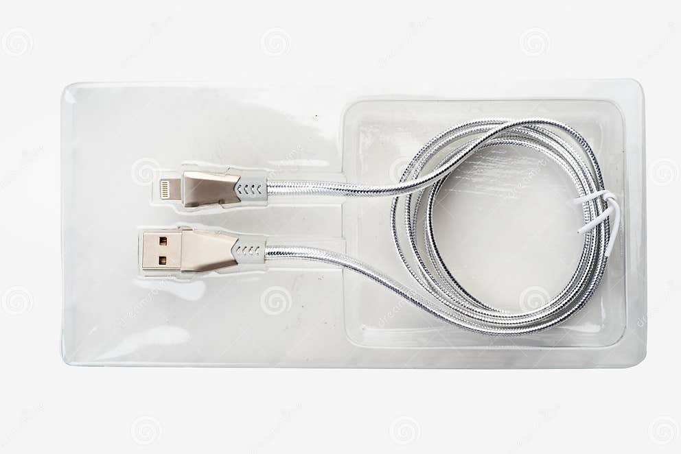 Silver-colored USB Cable in Plastic Packaging on a White Background ...