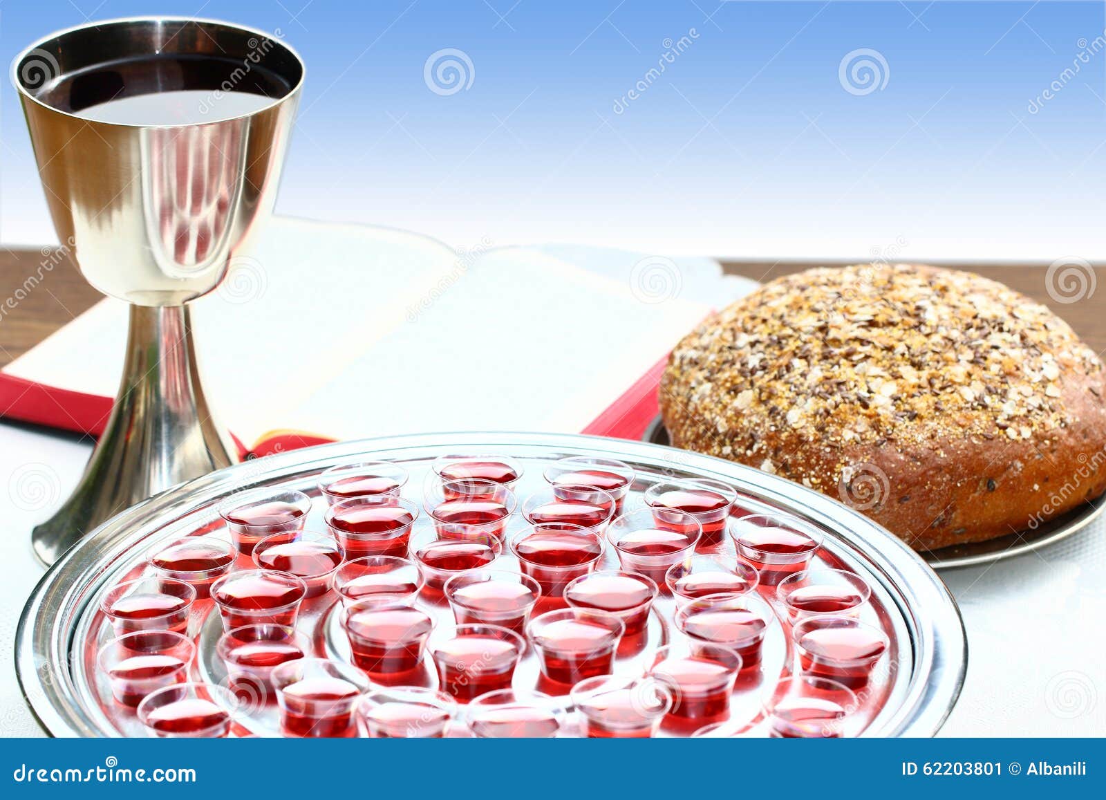 Silver Communion Ware with Open Bible and Bread Stock Image - Image of ...
