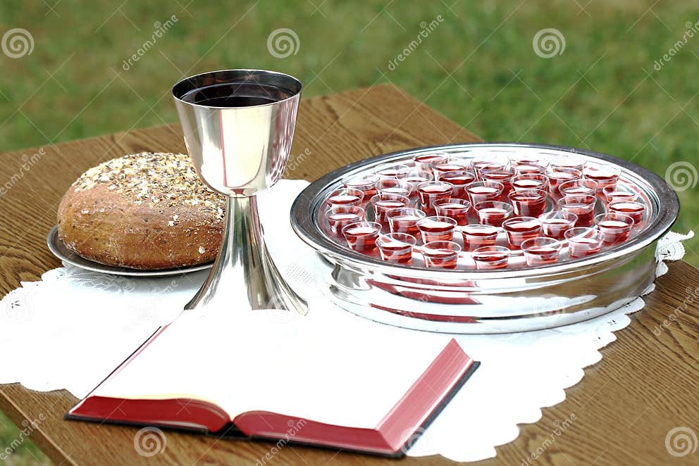 Silver Communion Ware with Open Bible and Bread Stock Photo - Image of ...