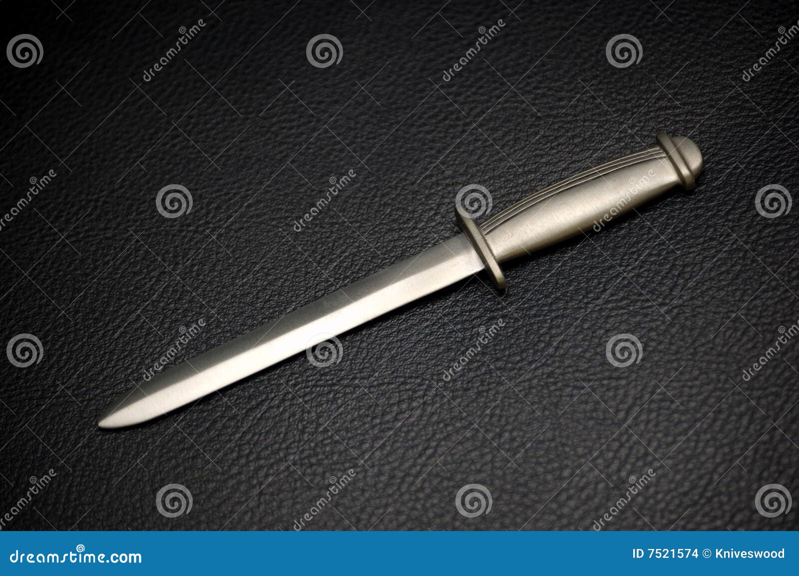 Silver Dagger on Black Leather Stock Photo - Image of knife, black: 7521574