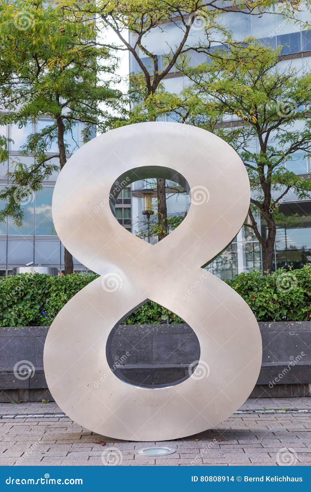 Silver Eight in Front of Modern Office Buildings Stock Photo - Image of ...