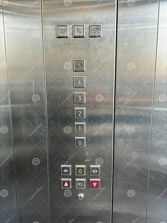 The Silver Elevator Has a Number of Buttons on it Stock Photo - Image ...