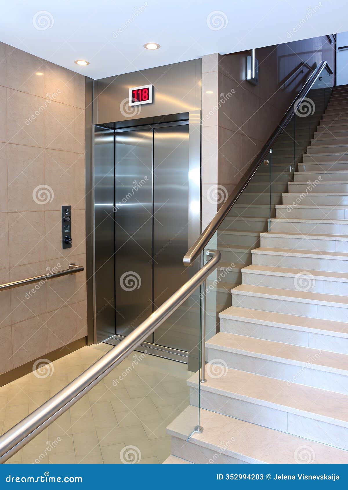 A Silver Elevator with a Red Sign that Says "1" on it Stock ...