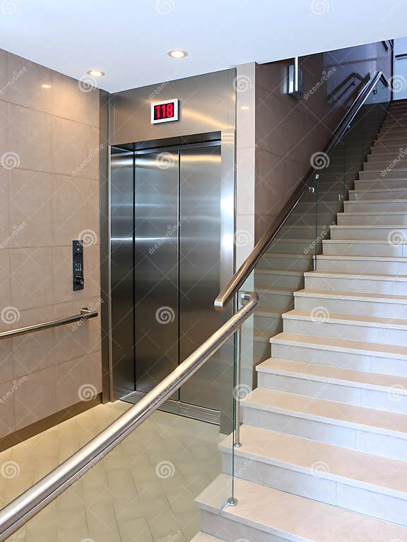 A Silver Elevator with a Red Sign that Says "1" on it Stock ...