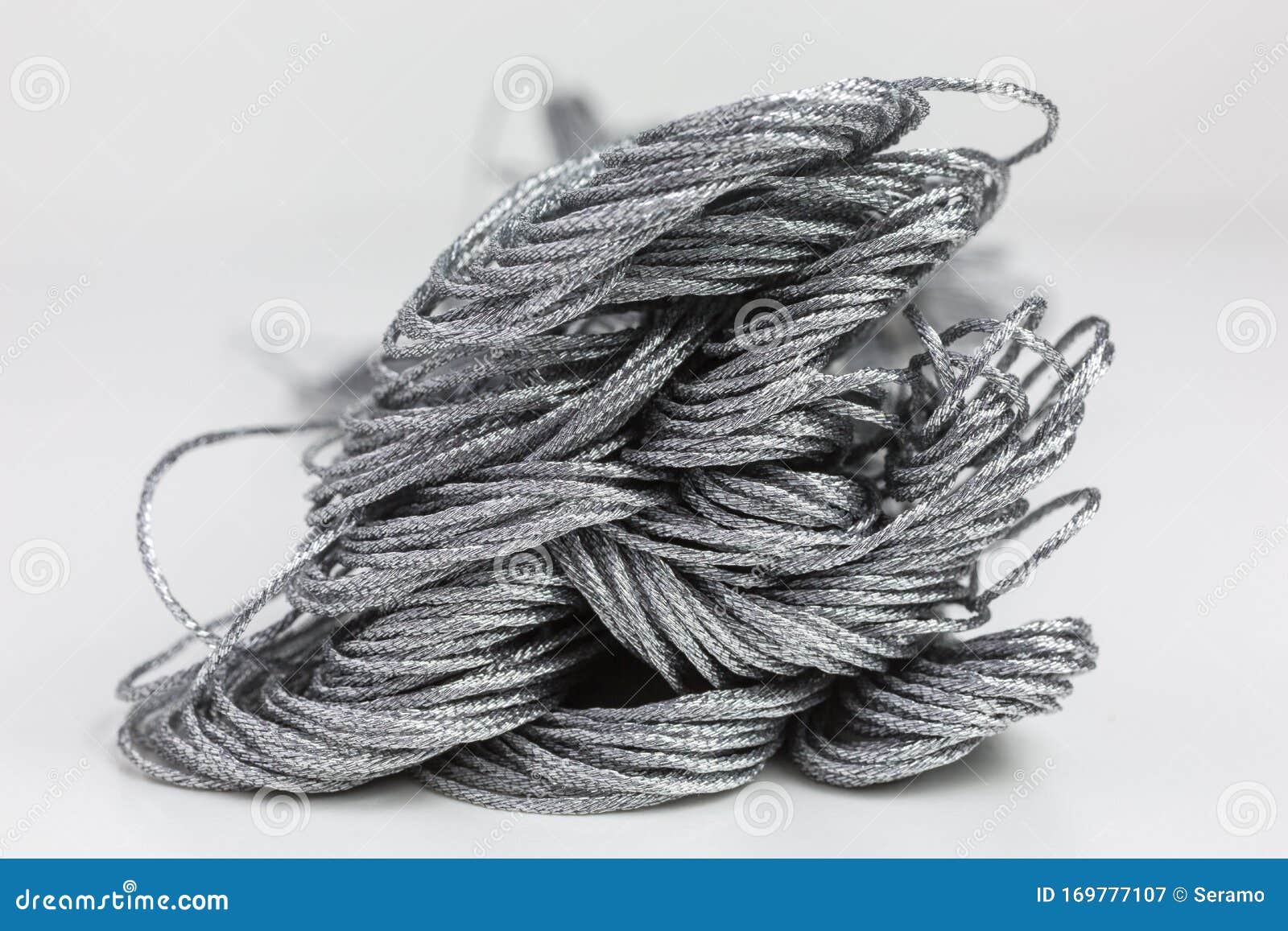 Silver embroidery thread stock image. Image of silver - 169777107