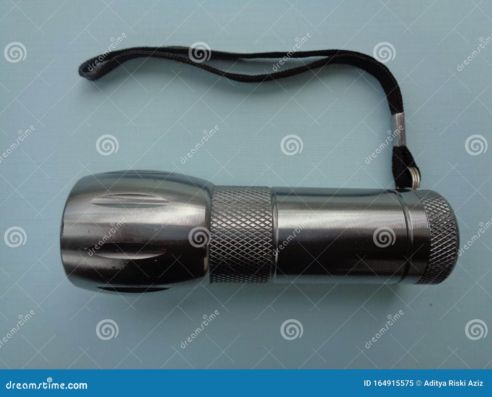 Silver Flashlight with Blue Background Stock Image - Image of emergency ...