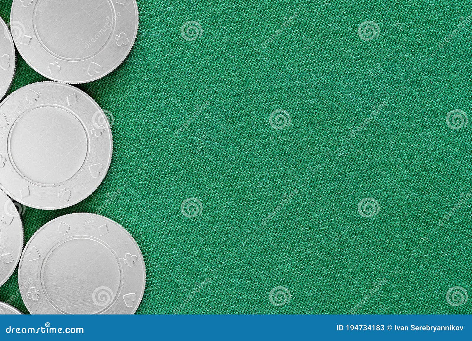 Silver Gambling Chips on the Green Poker Table Surface Stock Image ...