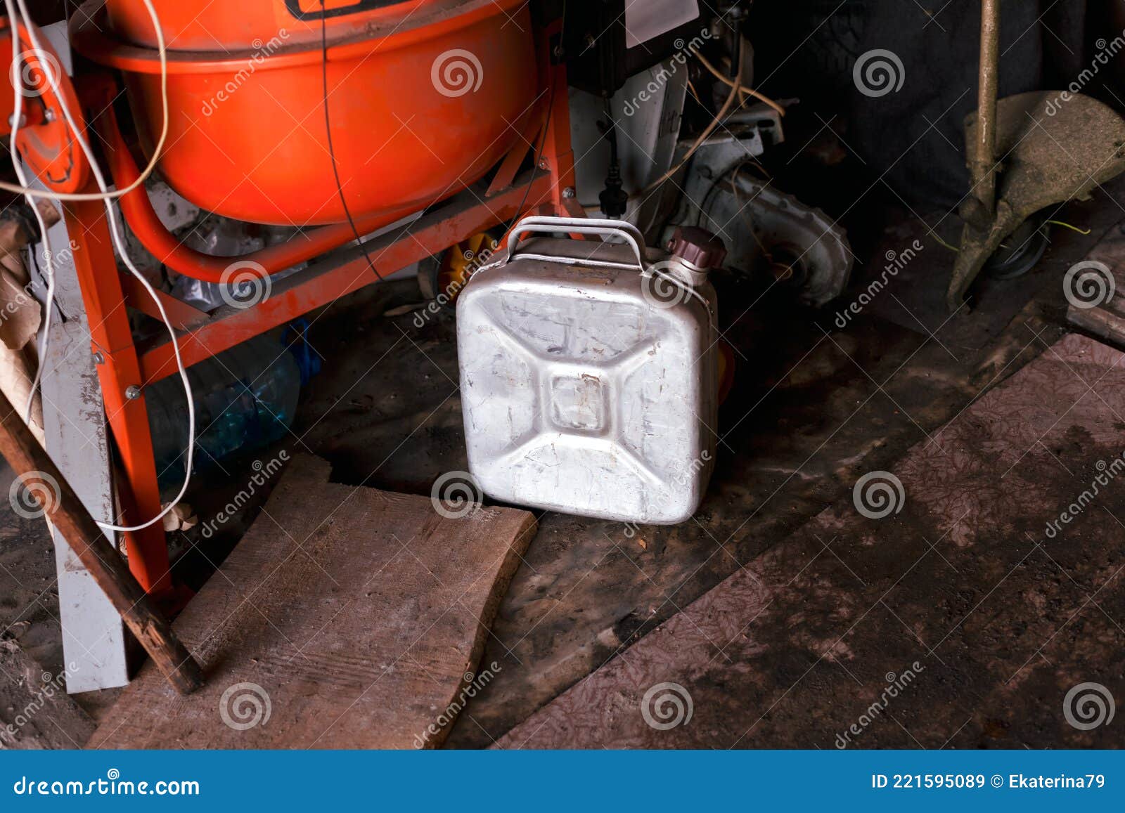 A Silver Gas Can in Dark Dusty Garage Stock Image - Image of ...