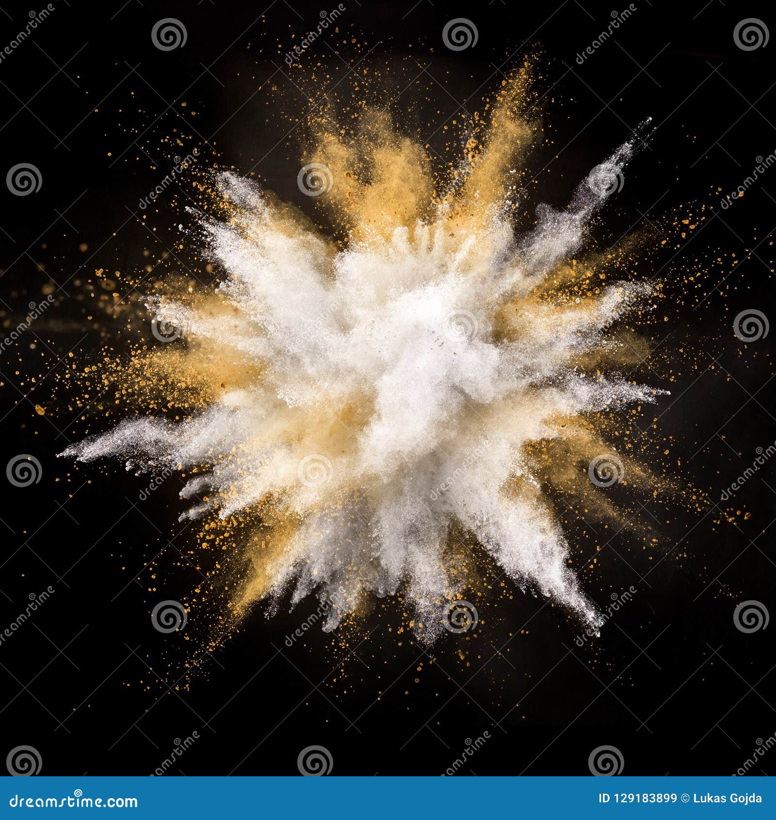 Silver and Gold Powder Explosion on Black Background. Stock Image ...