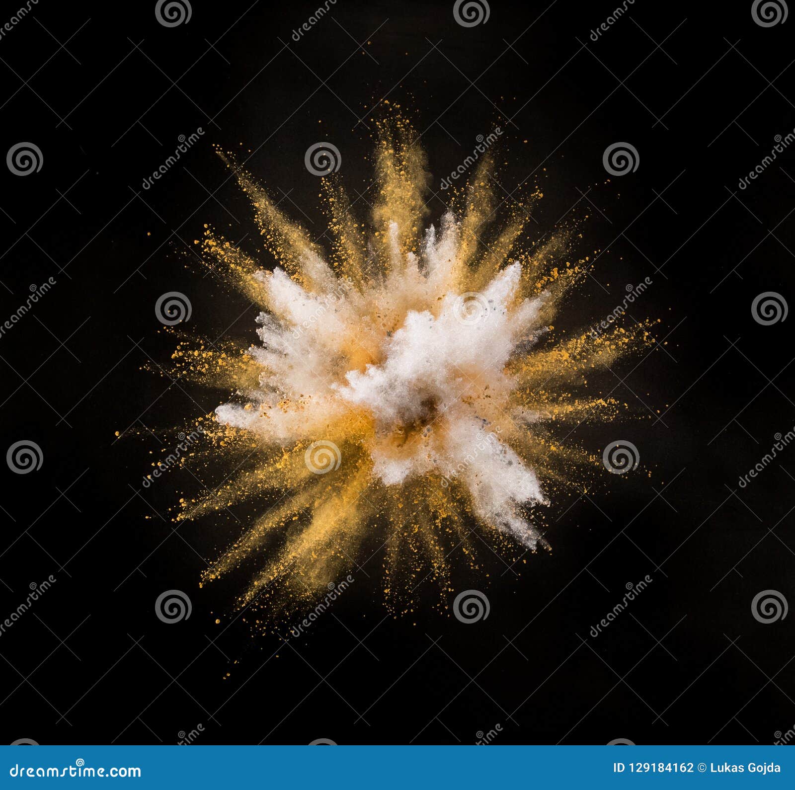 Silver and Gold Powder Explosion on Black Background. Stock Photo ...