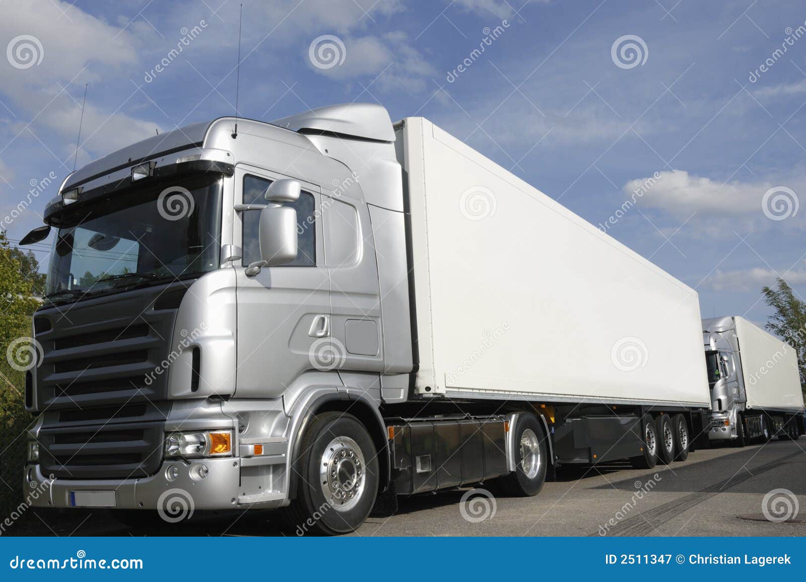 Silver-grey new trucks stock image. Image of deliveries - 2511347