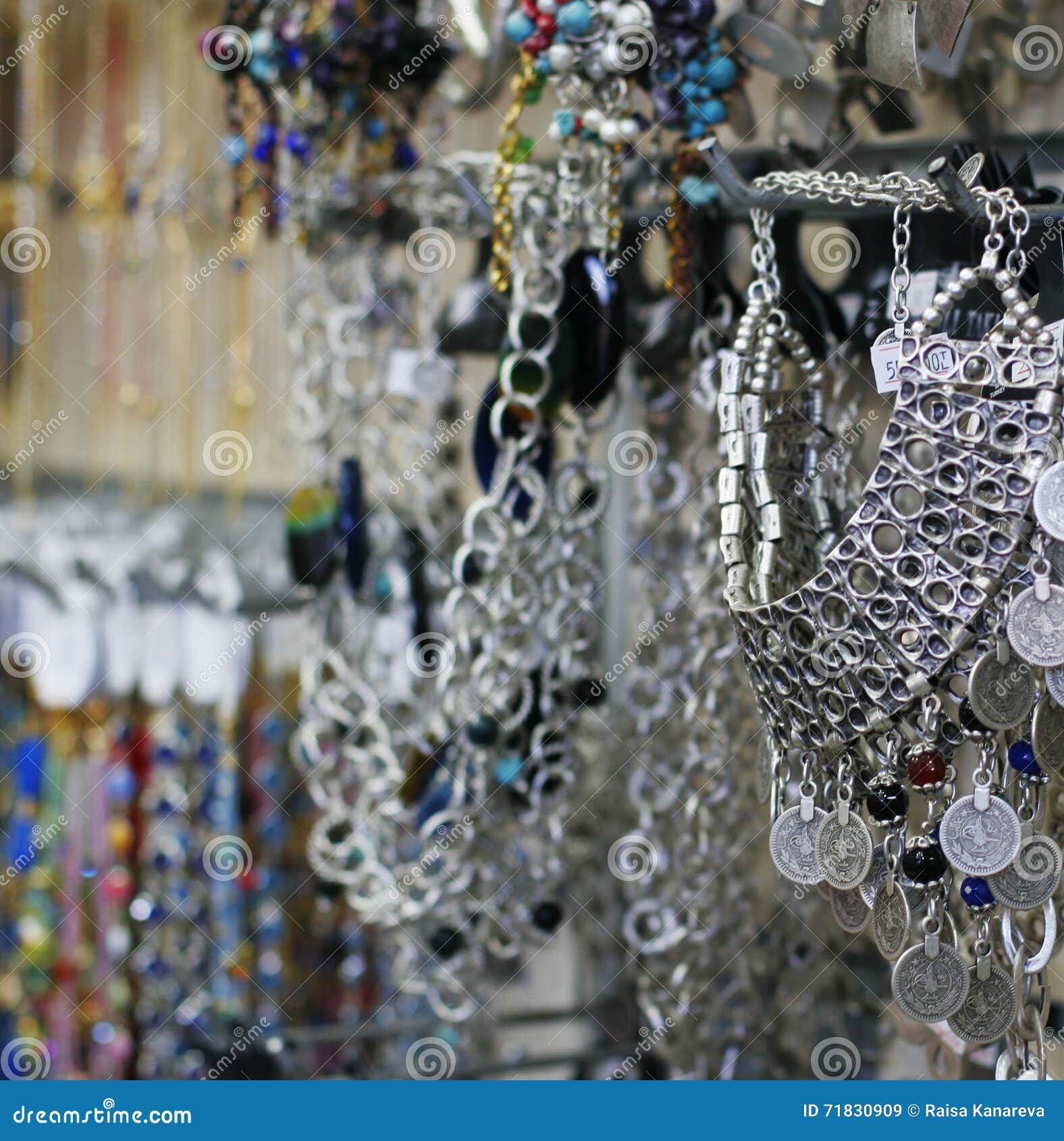 Silver jewelry in the shop stock image. Image of jewel - 71830909