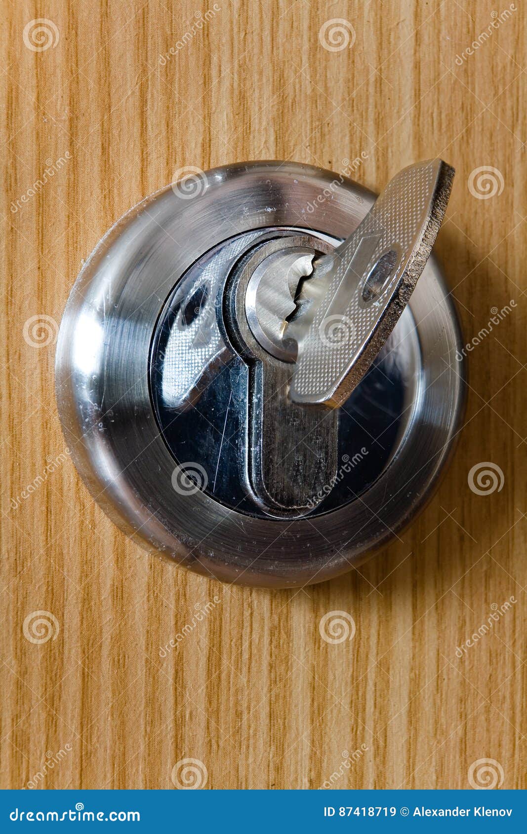 The Silver Key is Inserted into the Keyhole. Stock Image - Image of ...