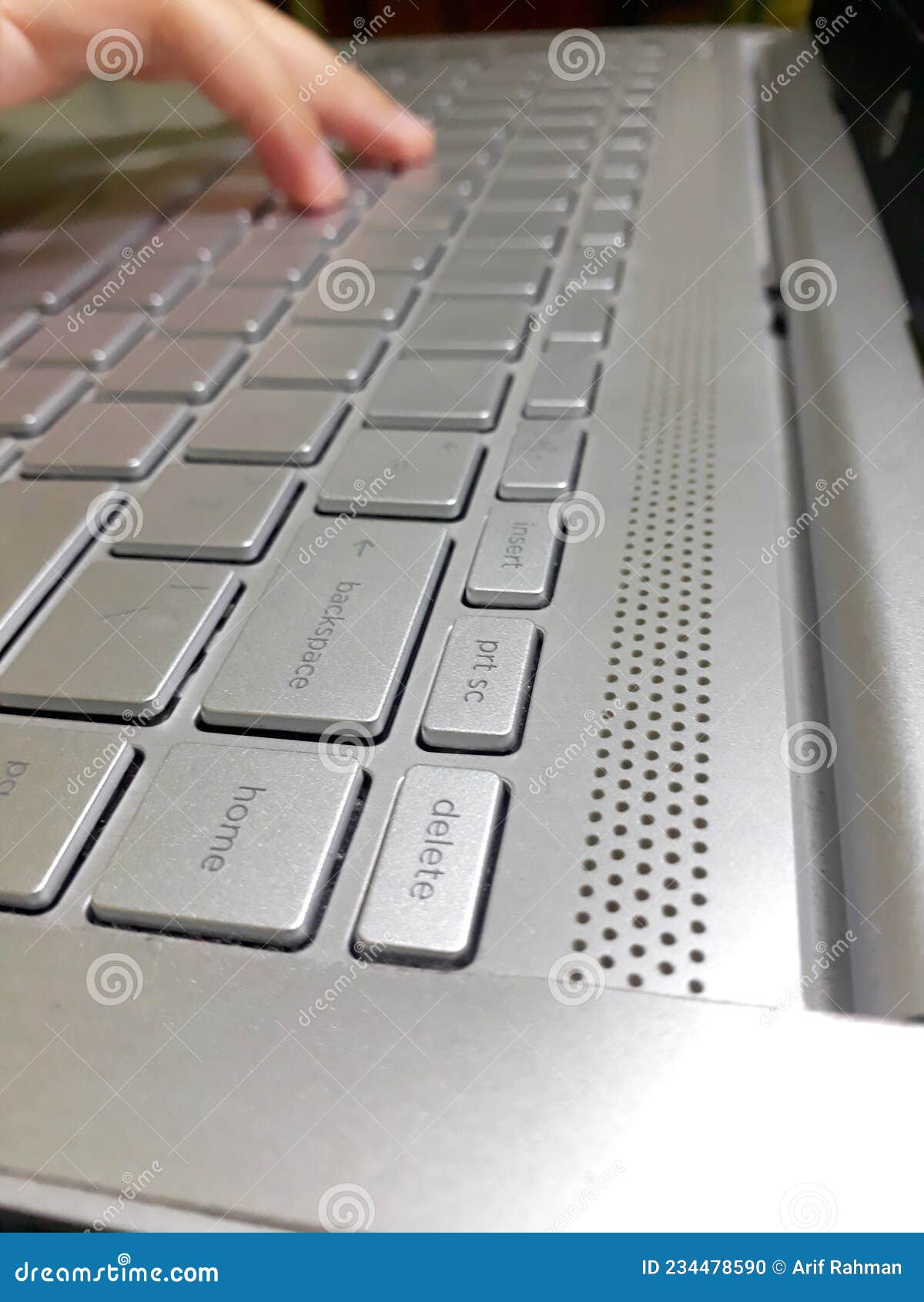Silver Laptop Keyboard Being Used for Work Stock Photo - Image of ...