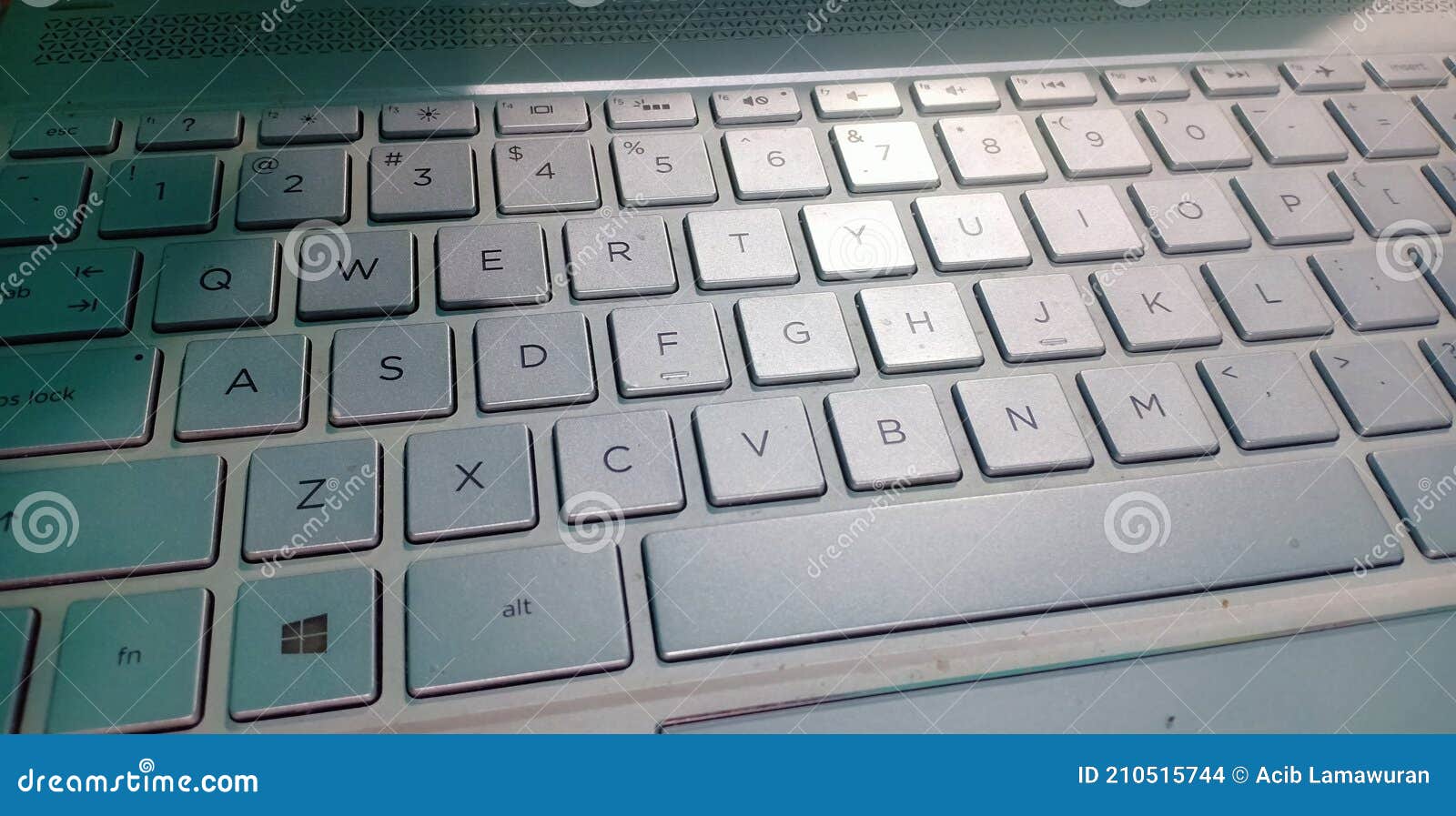 Silver laptop keyboard editorial stock image. Image of communication ...