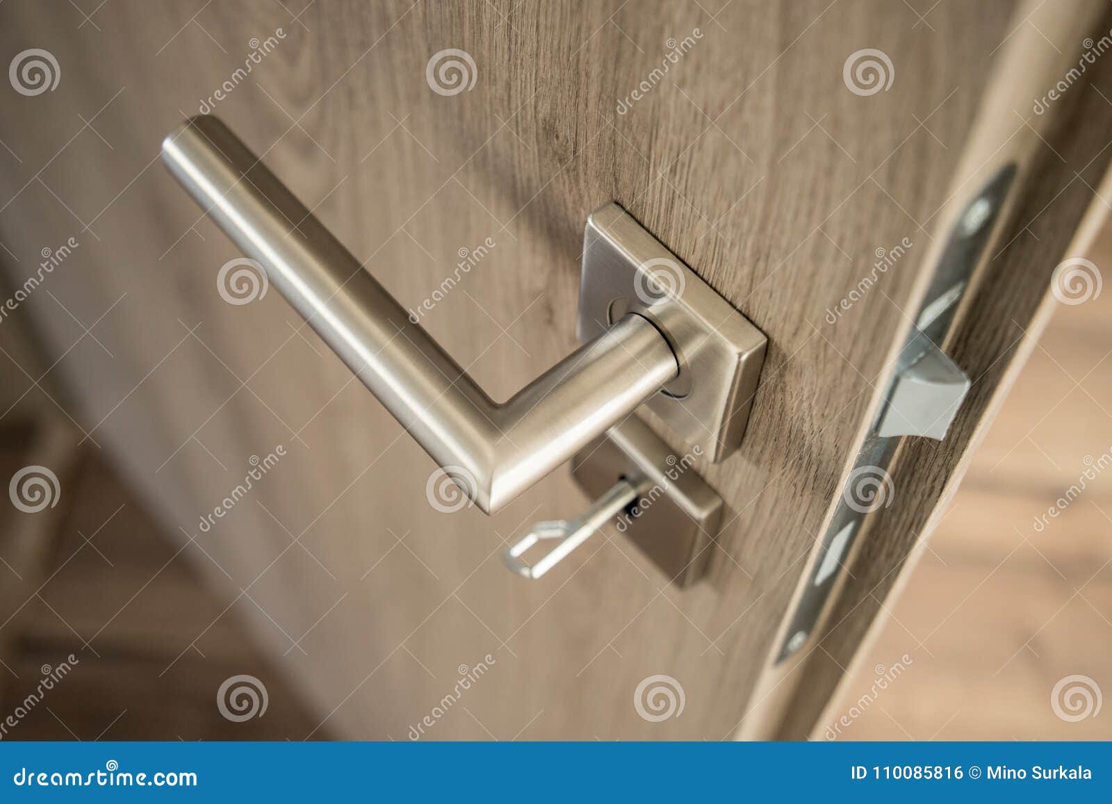 Silver Matte Door Handle on an Oak Wooden Door Stock Photo - Image of ...
