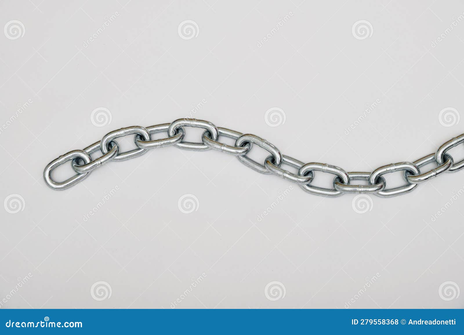 Silver Metal Chain on Gray Surface Stock Photo - Image of stainless ...