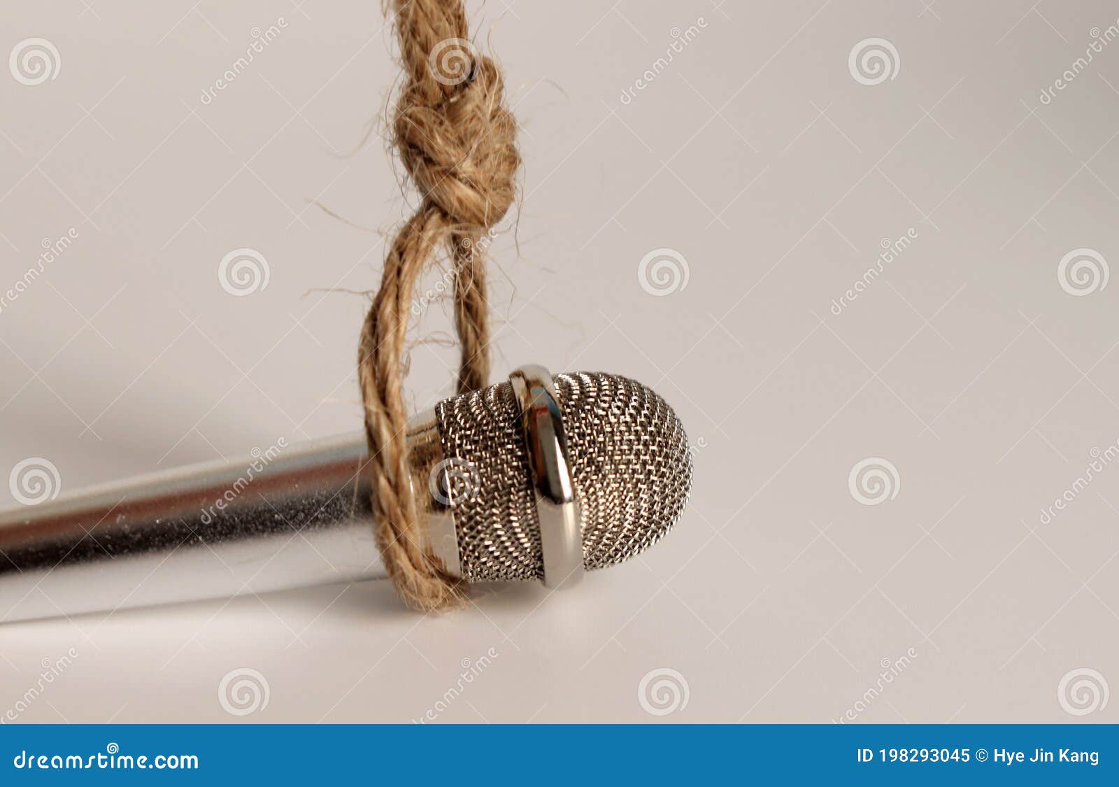 A Silver Microphone Tied To a Rope. Stock Image - Image of ropen ...