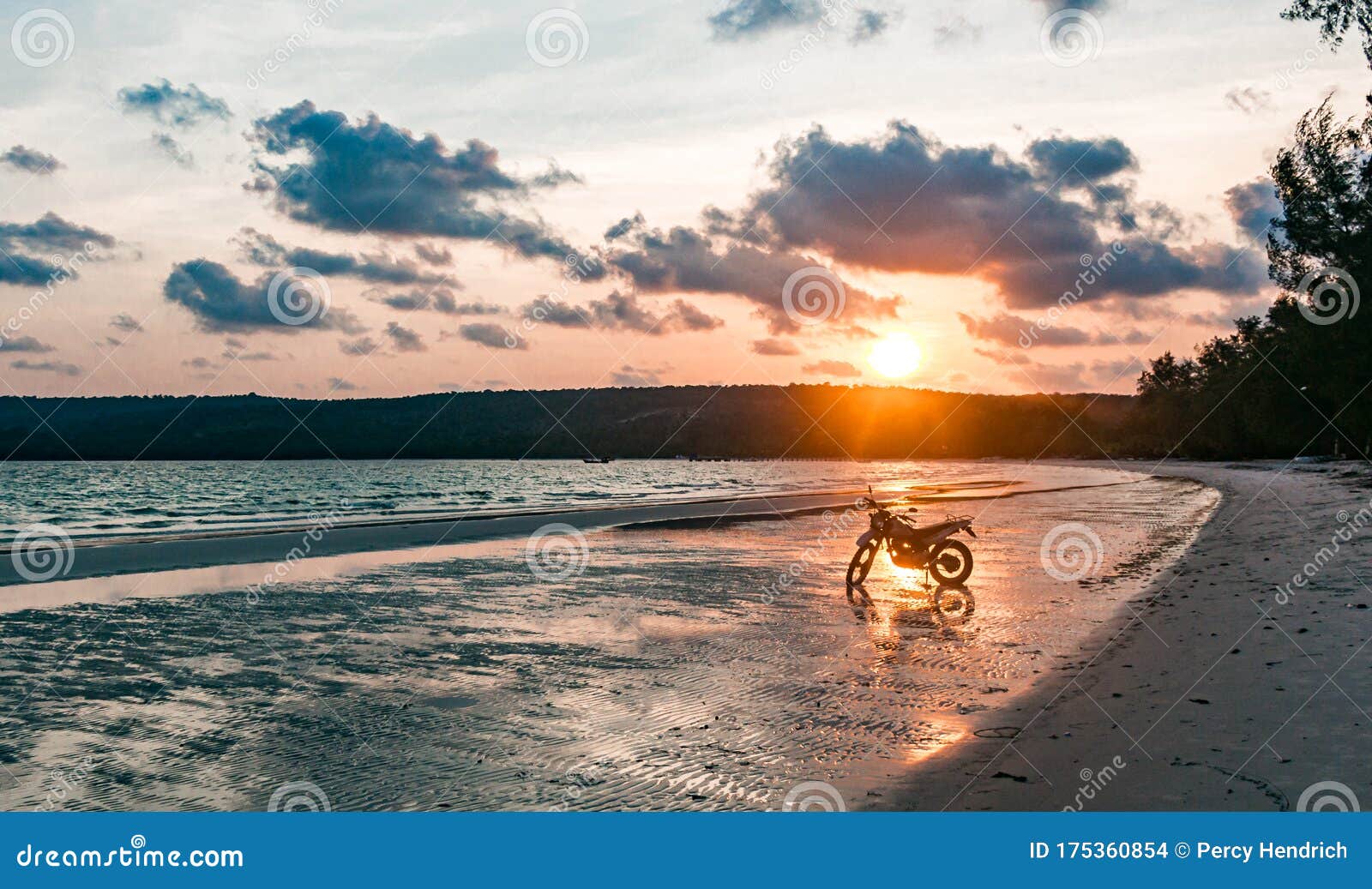 A Silver Motorbike is Standing at the Beach at Sunset Stock Photo ...
