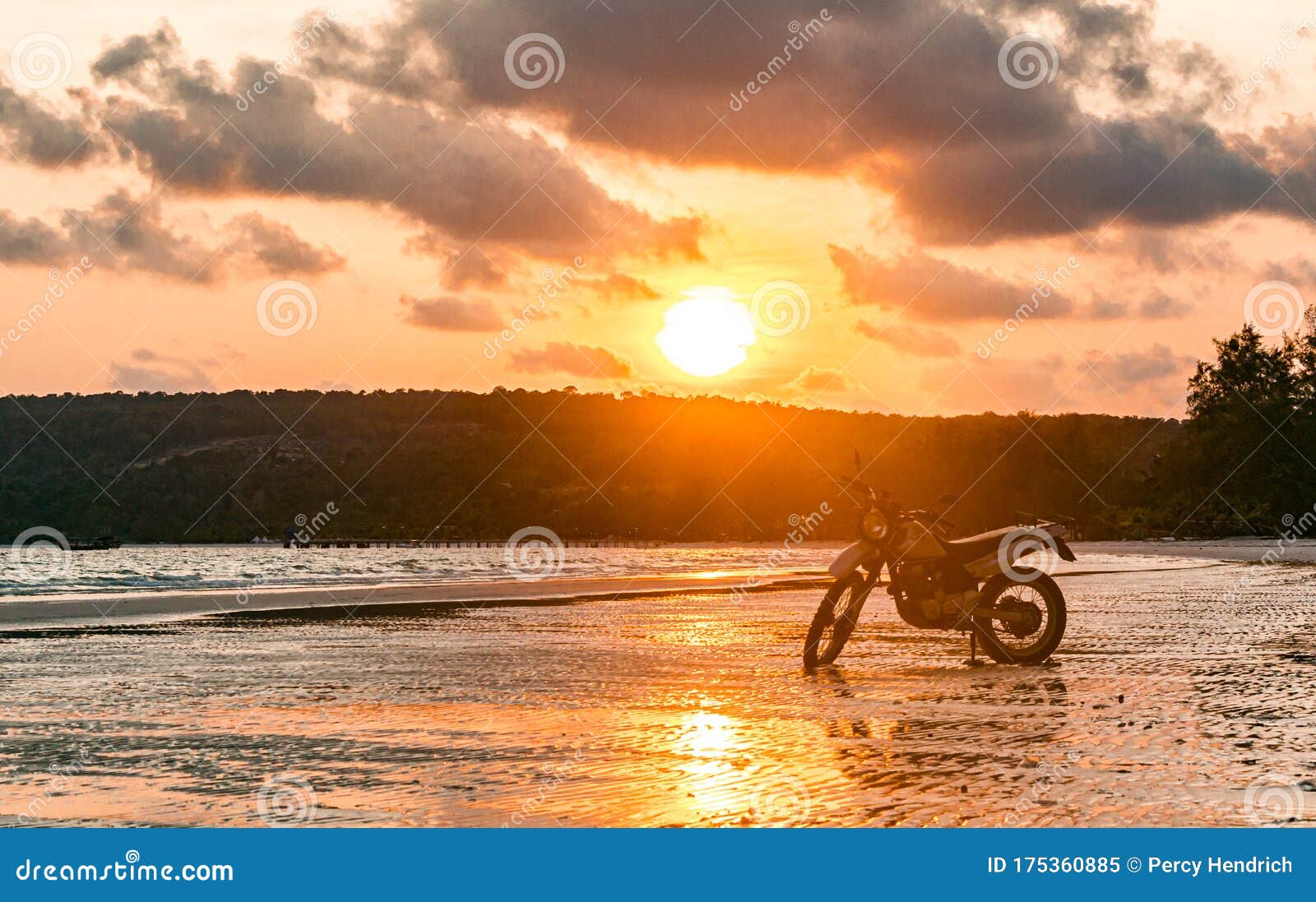 A Silver Motorbike is Standing at the Beach at Sunset Editorial Image ...