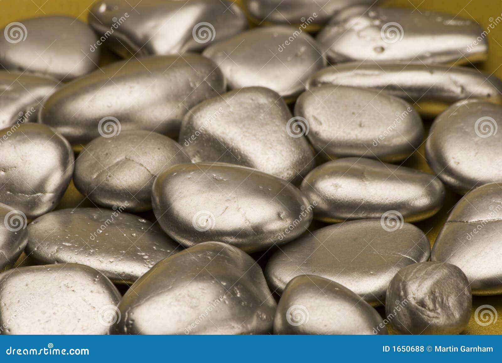 Silver painted stones stock photo. Image of foil, calm - 1650688