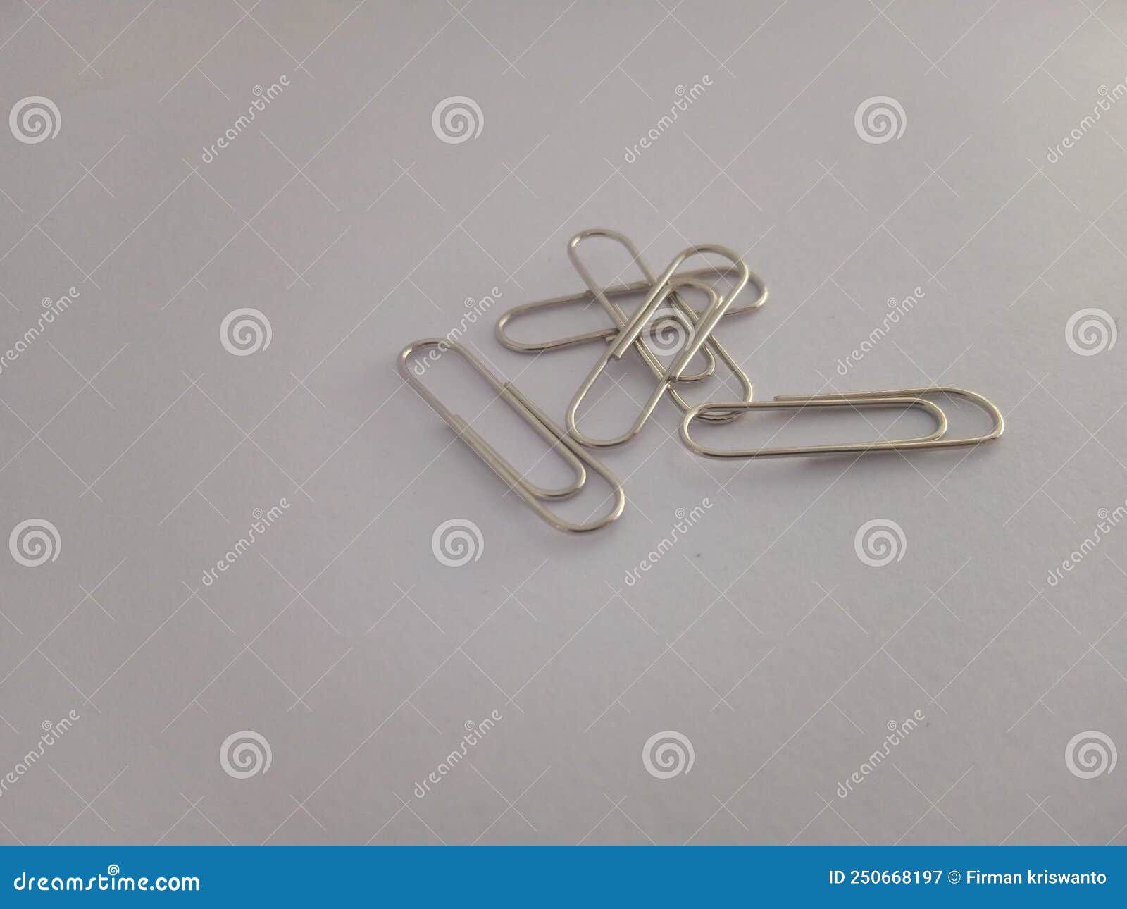 Silver Paper Clips Made of Iron Stock Image - Image of iron, silver ...