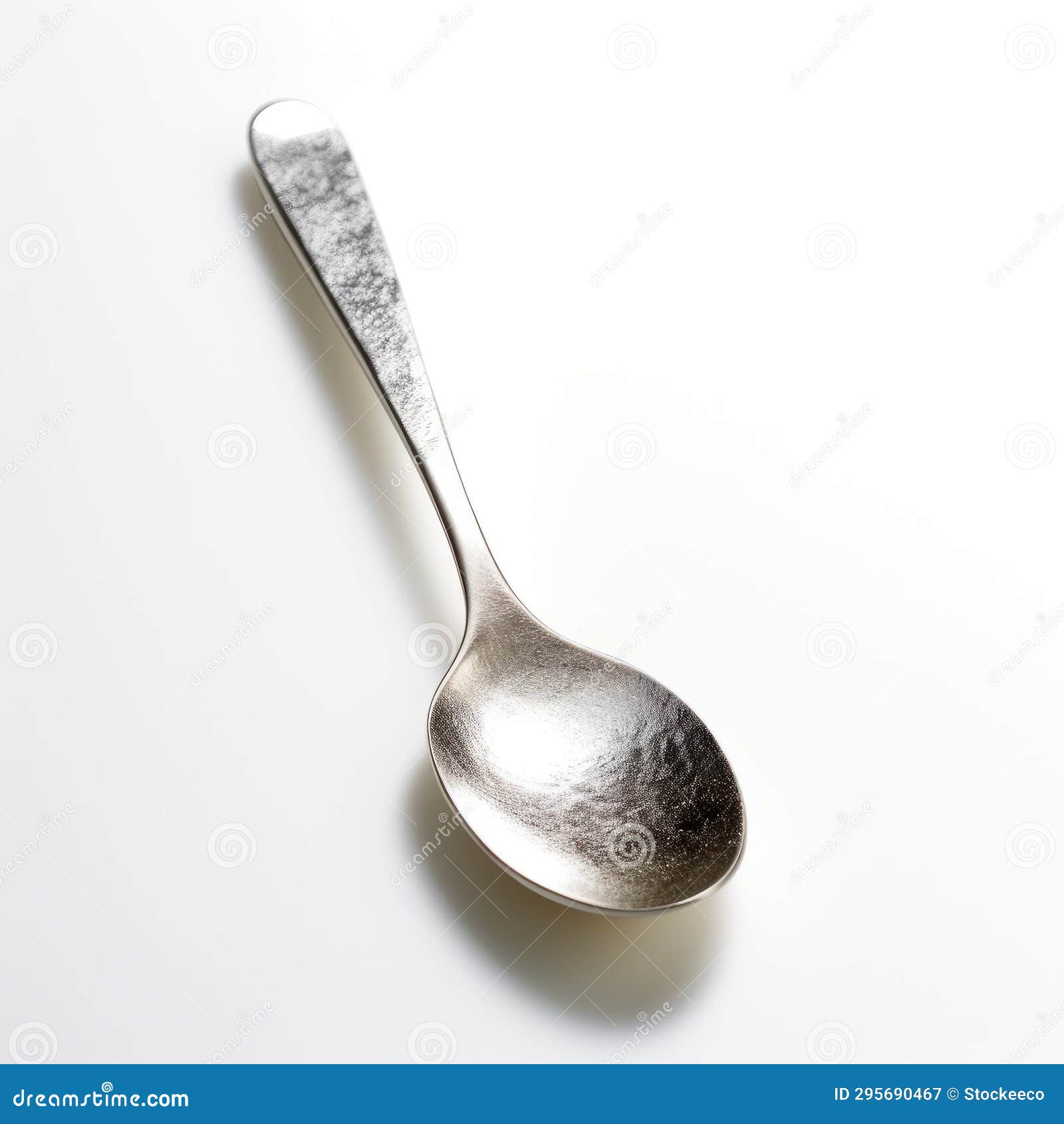 Silver Plate Spoon with Shiny Bumpy Texture on White Background Stock ...