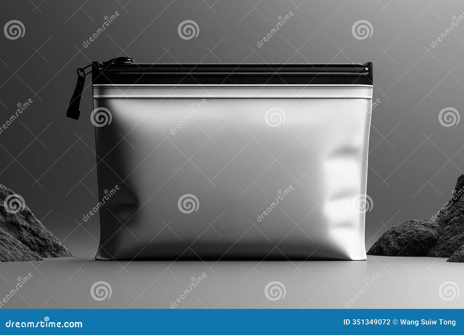 Silver Pouch Packaging Mockup between Two Rocks on Dark Background ...
