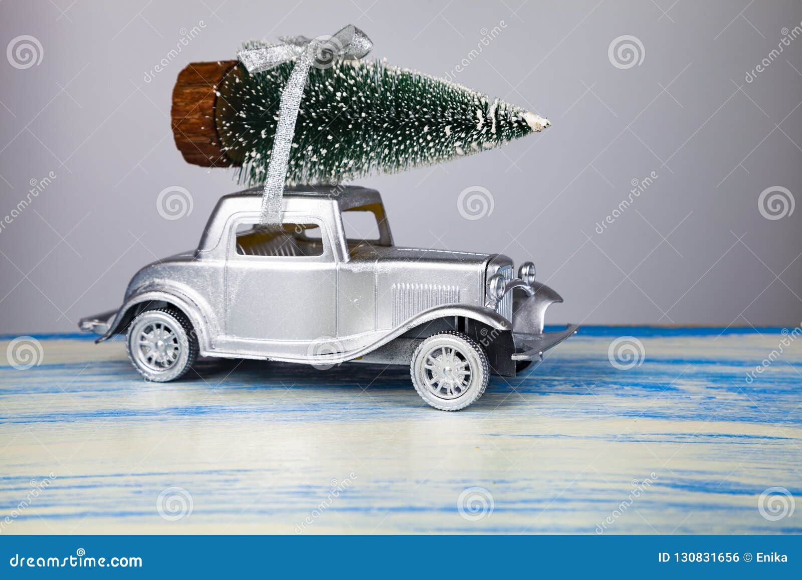 Silver Retro Car with a Tree on the Roof. Stock Photo - Image of pine ...