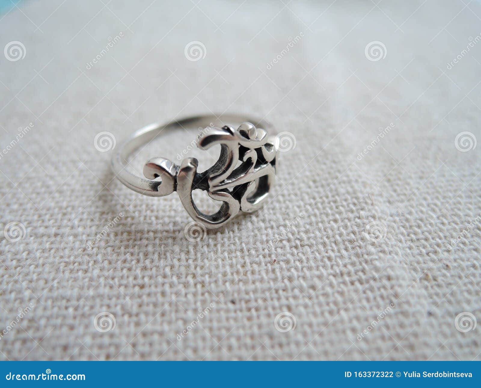 Silver Ring , the Symbol of OM. Silver Om Ring Stock Photo - Image of ...