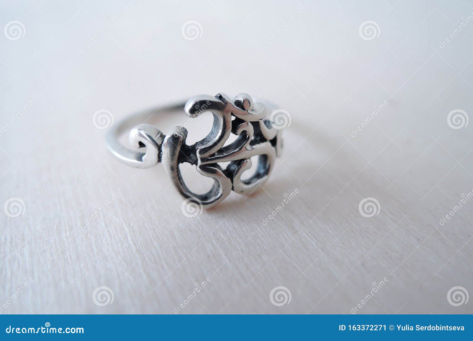 Silver Ring , the Symbol of OM. Silver Om Ring on White Background ...