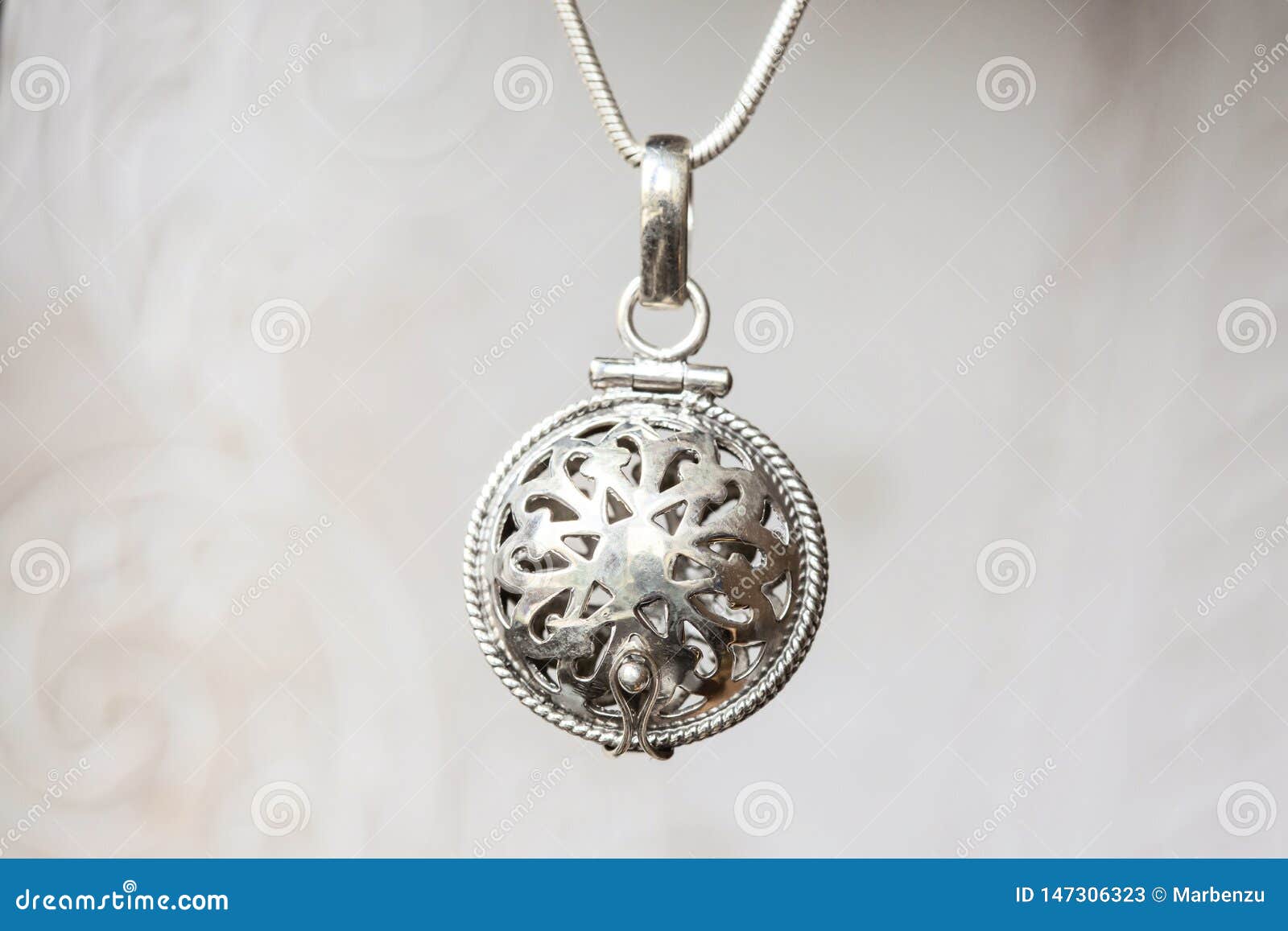 Silver Pendant on Natural White Background Stock Image - Image of ...